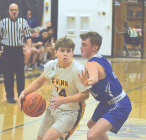 Gwinn Modeltowners boys basketball team gets big late-season win over ...